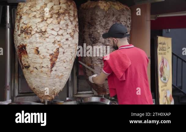 Making of Kebab Shawarma from Chicken and Beef on Spinning Griller ...