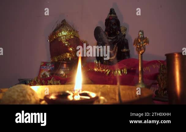 A close up shot of SHIVA prayer and ritual during MAHASHIV RATRI ...