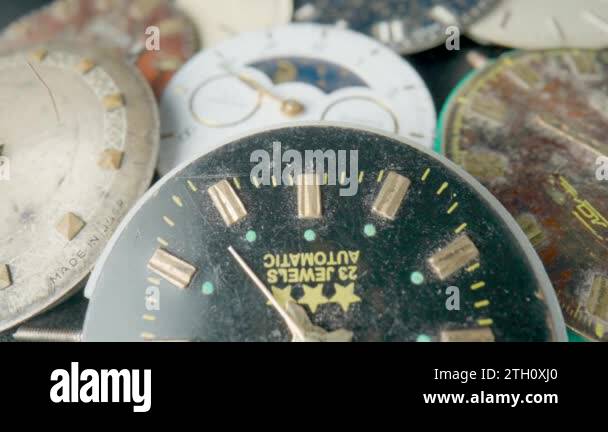 Old worn clock dials from the USSR. Aged scratched round watch faces ...
