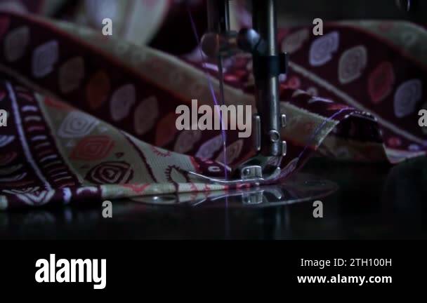 Vintage sewing machine needle in motion slow mo. Close-up of a sewing ...