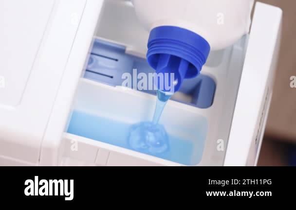 Pour some laundry detergent on the clothes and put it in the washing ...