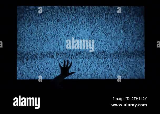Hands on the background of the noise of the TV scary scene for a horror ...