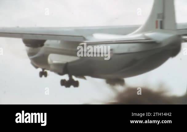 Heavy lift turboprop freighter airplane take off during an airshow ...