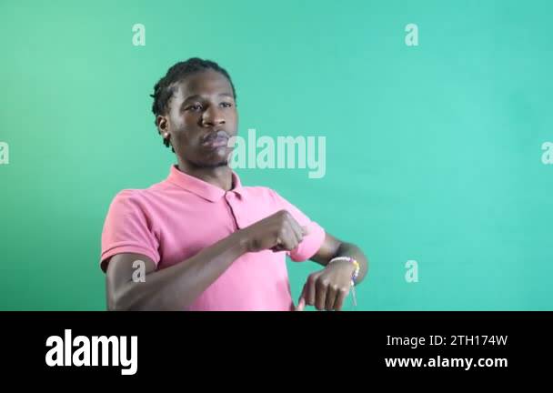 Young man dancing cheerfully, black male showing dance moves, dancing ...