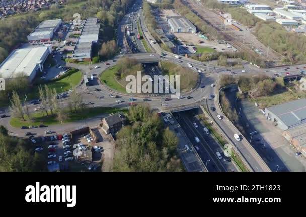 Aerial footage of a large section of commuter motorway, highway, during ...