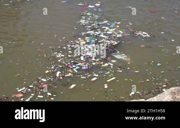 Plastic pollution of sea, ocean and river water. Plastic waste and ...
