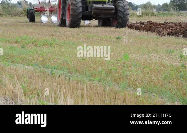 tractor vehicle closeup plow trench furrow agriculture field Stock ...