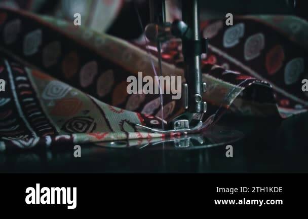 Vintage sewing machine needle in motion slow mo. Close-up of a sewing ...