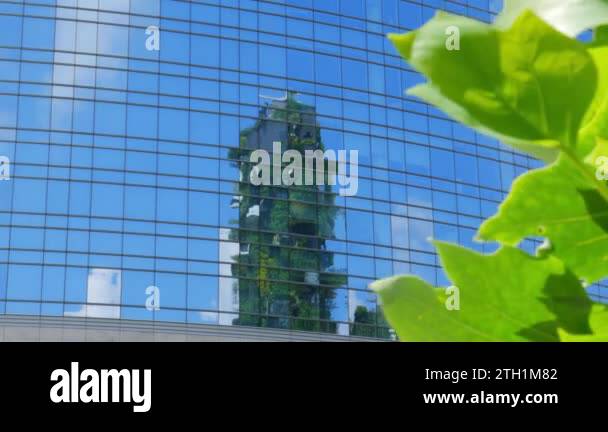 Reflection inside a modern building, showing Bosco Verticale in Milan ...