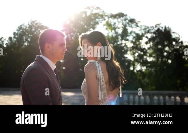 A pretty girl looks up and looks into the eyes of her lover. The ...