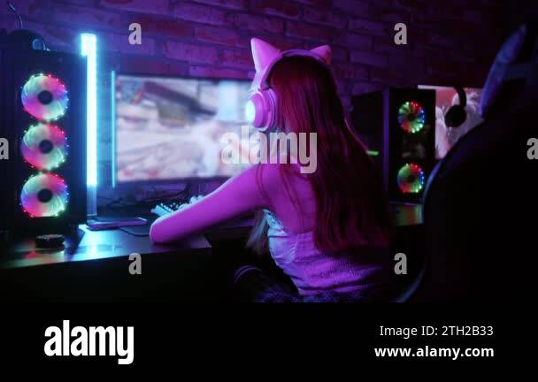 Cute gamer girl playing shooter - turns around and showing a middle ...