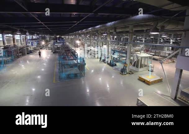 Automated factory with self-managed robots. Robots in an automated factory. Visualization of ...