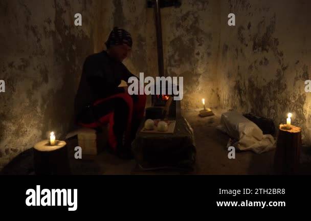 The guy in the abandoned hut is going to cook. There are products on ...