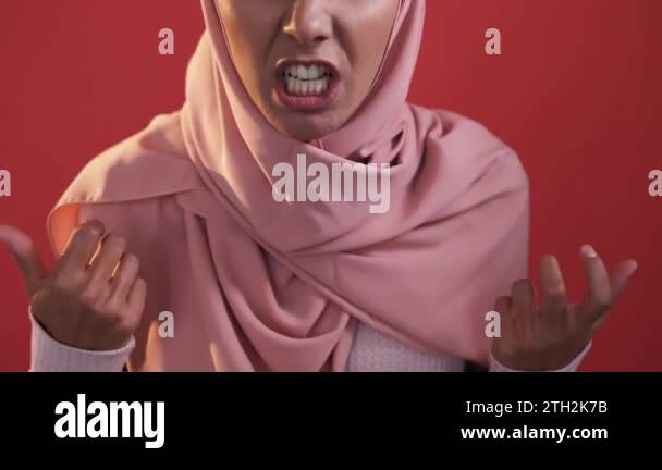 Angry woman. Aggressive expression. Anger agony. Grumpy furious cursing ...