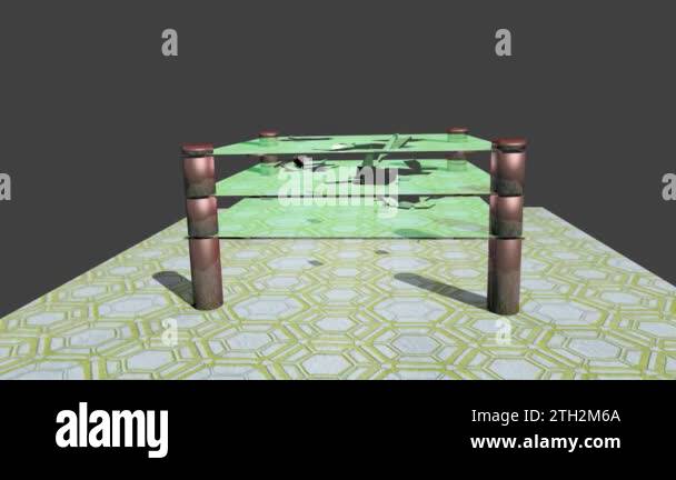 Three objects are falling on some glass table leaving some shrads of ...