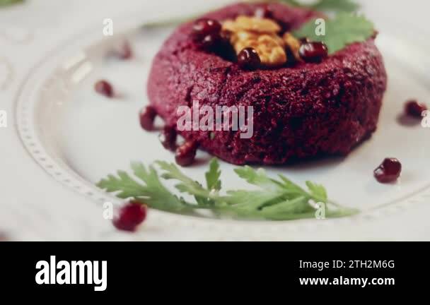 Pkhali traditional Georgian food. Beetroot is used for the purple color ...