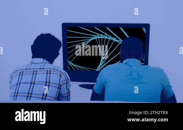 Composition of back of two diverse men watching tv. electronic devices ...