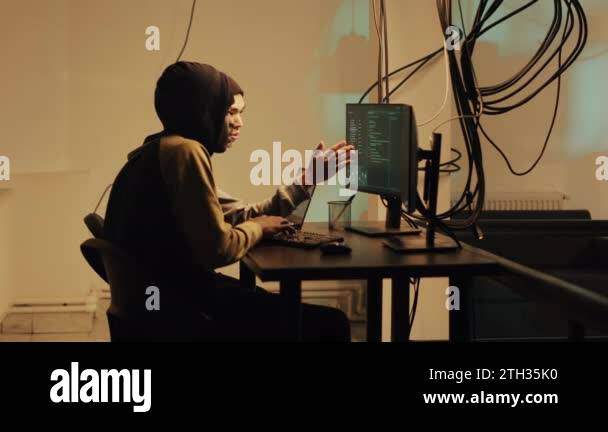 Spy using hacking concept and hacktivism for digital espionage, stealing important government ...