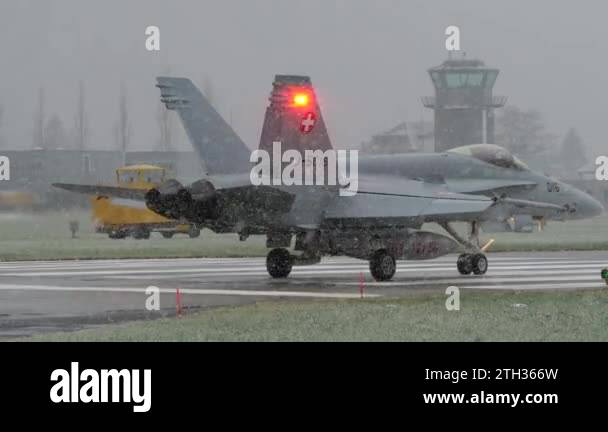 Jet fighter plane takes off at full power with afterburner flames ...