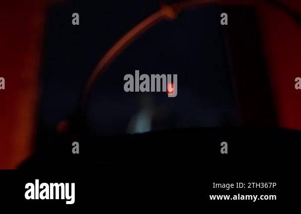 Religious holy cross glowing at night with campfire, celebrating easter ...