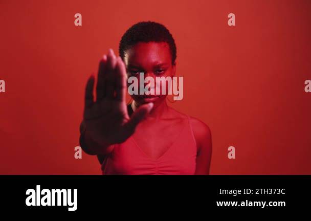 Stop racism. Black lives matter. Ethnic equality. Red neon color light ...