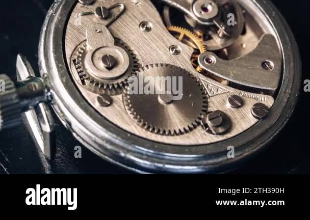 Timelapse of mechanism of vintage stopwatch with rotation close-up ...