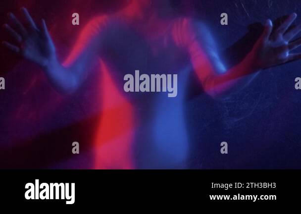 Trapped child. Defocused silhouette. Freedom isolation. Red blue neon ...