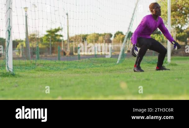 Video of african american football male goalkeeper with ball. Male ...