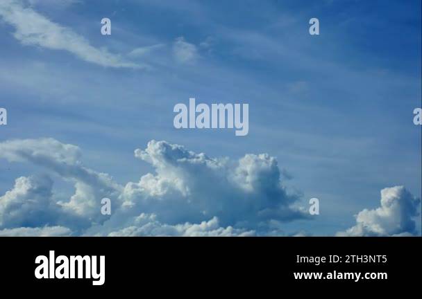 Blue sky white clouds. Puffy fluffy white clouds. Cumulus cloud cloudscape timelapse. Summer ...