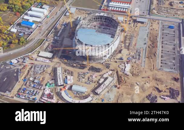 Process of constructing new football arena bowl at building site ...