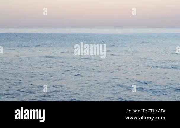 Horizon line between the surface of the sea with ripples on the water ...