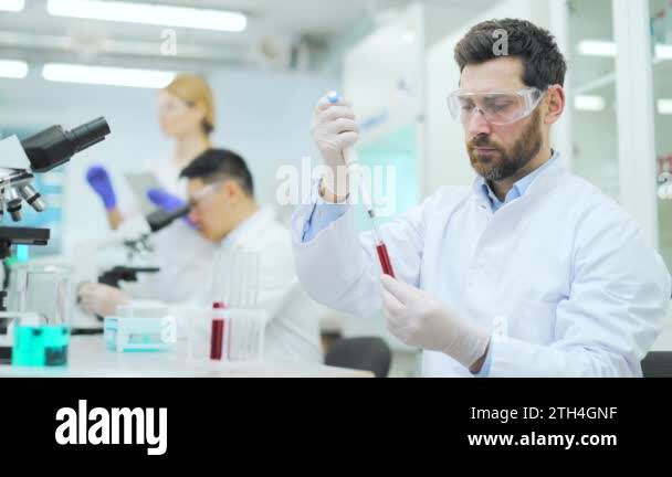 Man sample scientist experiment Stock Videos & Footage - HD and 4K ...