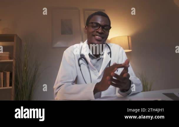 Doctor video chat. Telehealth meeting. Virtual checkup. Happy male ...