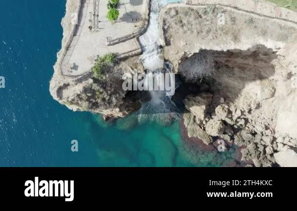 Drone video of a Mediterranean landscape where a river flows through a ...