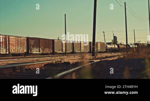 Old Freight Train Oil Tanker Cargo Cars Coming to a Stop at Empty ...