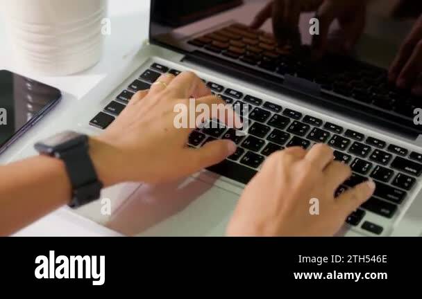 Typing keyboard. Close up Hands of business woman over laptop keypad ...