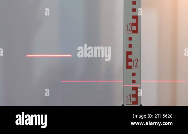 Laser levelling line and grade rod Stock Video Footage - Alamy