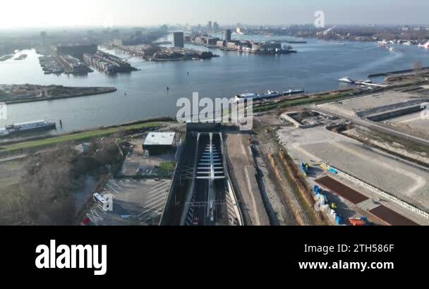 An aerial drone video capturing the dynamic intersection and transport ...