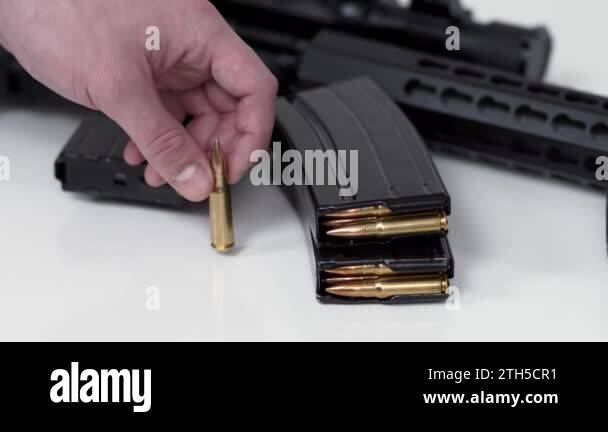 Black iron modern army military machine gun and cartridges, small arms ...