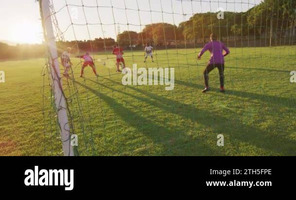 Video of diverse gorup of male football players on field,playing ...