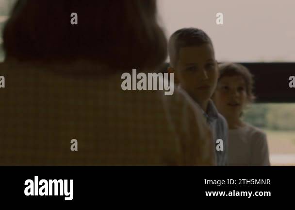 Group of aggressive teenagers pushing insulting school boy in corridor ...