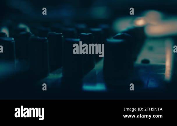 Close-up of fingers adjusting sound mixing console. Mixer console for ...