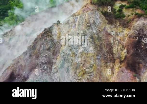 Close up aerial footage of the natural volcano rock formations and ...