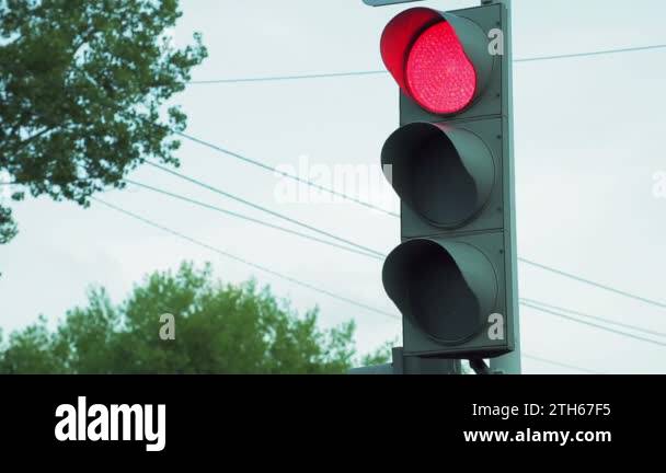 Traffic light switches from red to green Stock Video Footage - Alamy