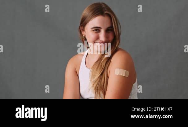 Band aid on the upper arm Stock Videos & Footage - HD and 4K Video ...