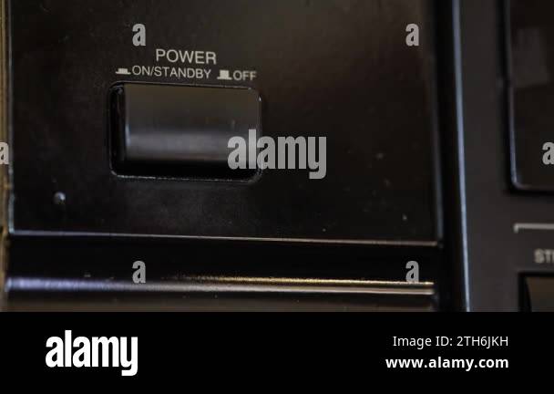 Dark Vintage Power button press scene. Turning the device on and off by ...