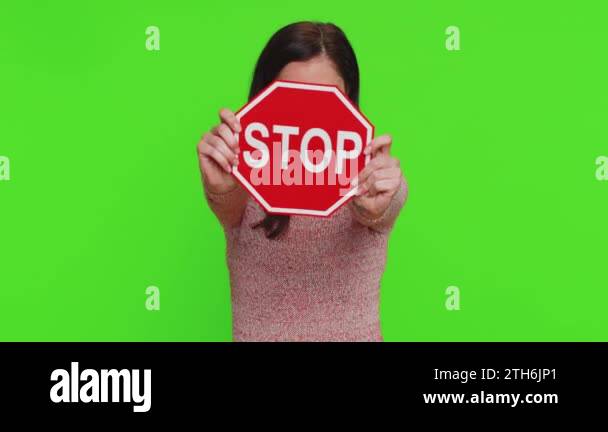Serious pretty woman say No, hold inscription text red No stop danger ...
