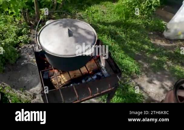 On grill stands cauldron Stock Videos & Footage - HD and 4K Video Clips ...