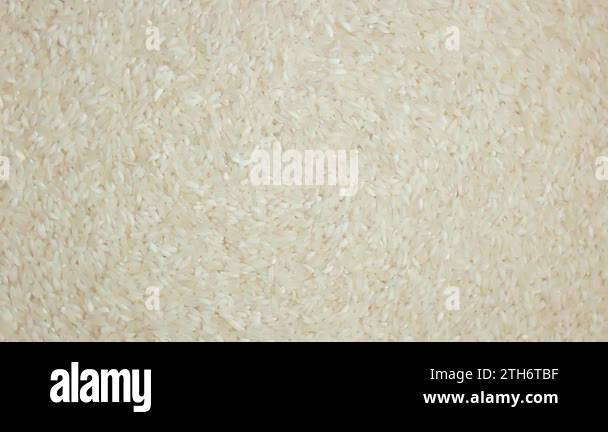 Dry Uncooked White Rice Background Slowly Rotating Right - Top View ...