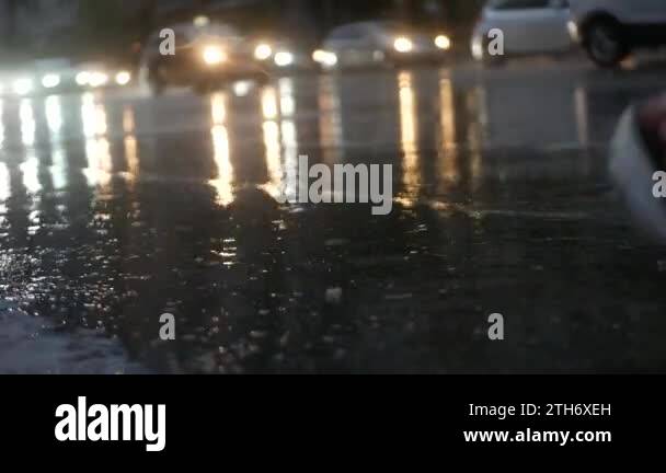 Road traffic on flooded road in heavy rain Stock Videos & Footage - HD ...